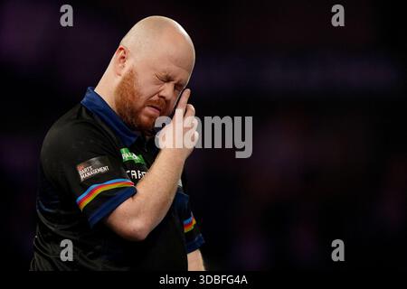 Justin Hood reacts during his match against Gary Anderson on day ...
