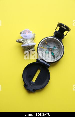 Santa Claus and compass. Christmas card Stock Photo - Alamy