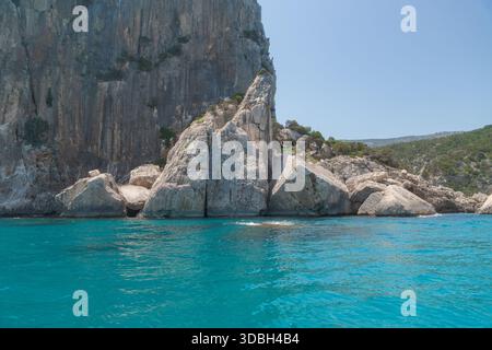 Turquoise sea under the bright summer sun of Ibiza, Cala Comte ...