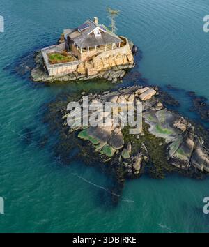 Island home. Solitary island house. Getaway house on rocky island ...
