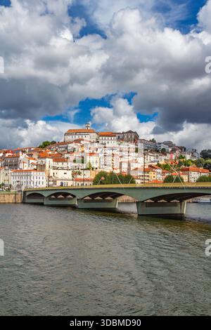 The Santa Clara Bridge over the Mondego river in Coimbra, Portugal, on ...