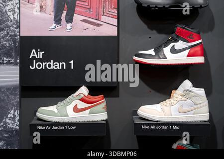 Nike Air Jordan shoes display in the interior of a sports shoe store ...