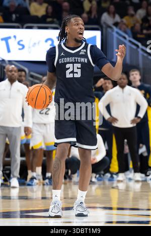Georgetown Hoyas guard Jeremiah Williams defends against UConn Huskies ...