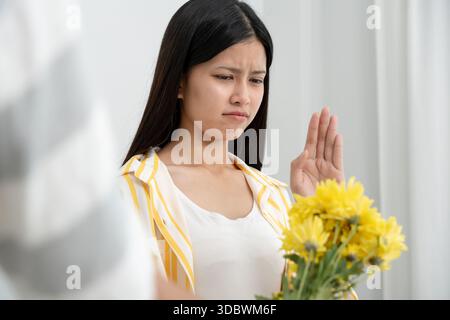 Pollen Allergies, asian young woman sneezing in a handkerchief or ...