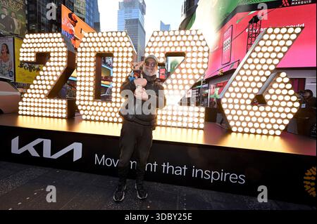 Joe Simon and his dog Gladys pose with he Times Square New Year's Eve ...