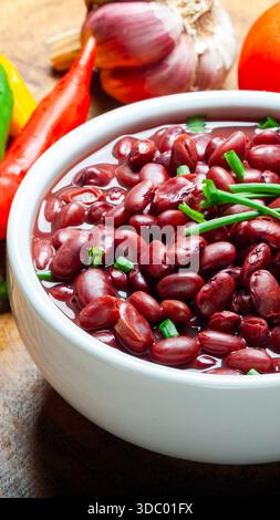 Canned boiled black beans in the bowk Stock Photo - Alamy