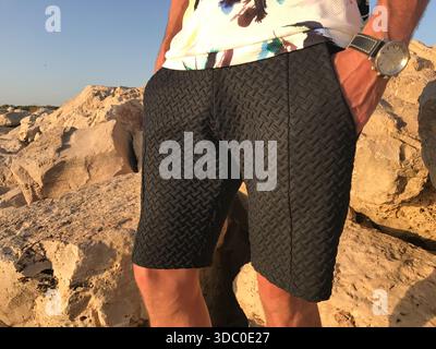 A male with a watch with hands in the pocket Stock Photo - Alamy