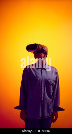 stylish woman in metaverse in vr headset Stock Photo - Alamy