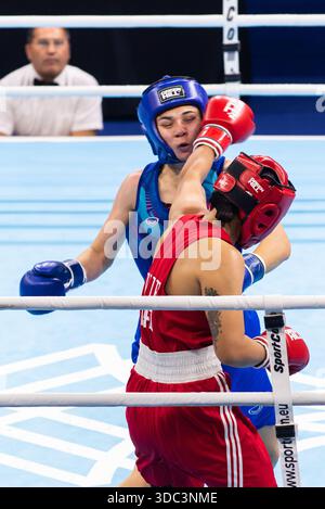Bangkok, Thailand. 19th Dec, 2025. Janjaem Suwannapheng (Red) of ...