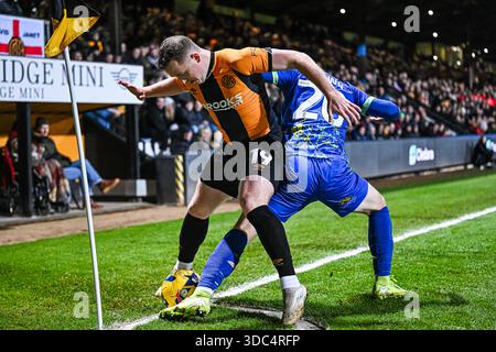 Shayne Lavery of Cambridge United challenged by Evan Weir of Walsall ...