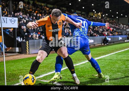 Shayne Lavery of Cambridge United challenged by Evan Weir of Walsall ...