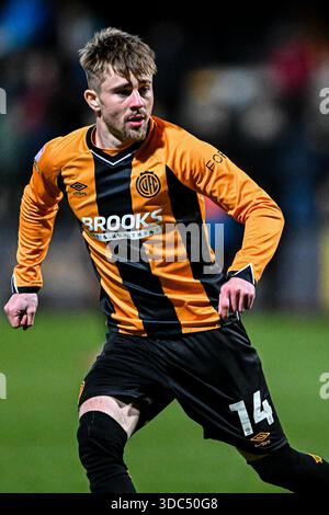 Benjamin Knight (14 Cambridge United) challenges Ryan Galvin (3 Barnet ...