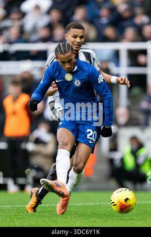 Joao Pedro of Chelsea shoots at goal, blocked by Nathan Collins of ...