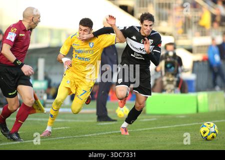 Fares Ghedjemis of Frosinone Calcio Andrea Bozzolan is in action during ...