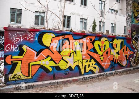 Graffiti tagged on a fence at Graffiti Alley fashion district in ...