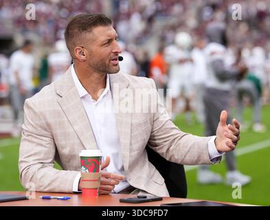 SEC Nation host Tim Tebow listens to his co-hosts during the SEC Nation ...