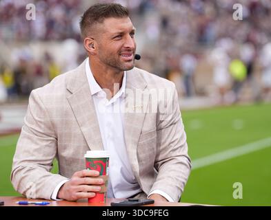 SEC Nation host Tim Tebow listens to his co-hosts during the SEC Nation ...