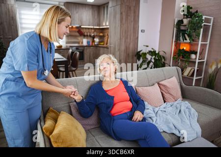 Caring conversation between nurse and patient in clinic Stock Photo - Alamy