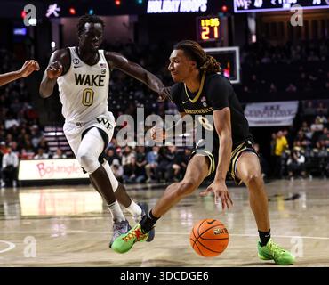 Vanderbilt guard Tyler Harris (8) dribbles the ball past New Haven ...