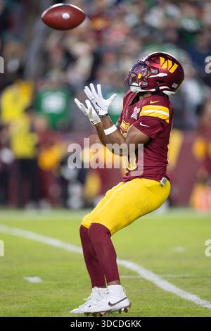 Washington Commanders wide receiver Treylon Burks (13) catching a pass ...