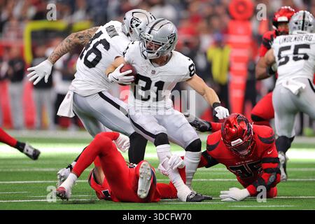 Raiders wide receiver Alex Bachman (81) takes the field after halftime ...