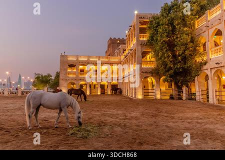 Evening view of Horse stables at Souq Waqif market in Doha, Qatar Stock ...