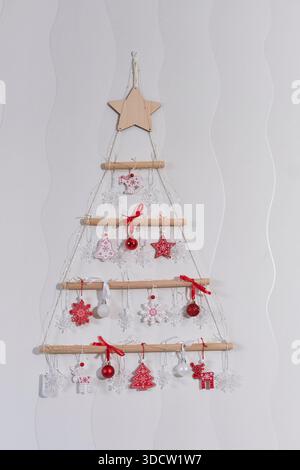 A festive atmosphere is created at Christmas with red berries and a ...