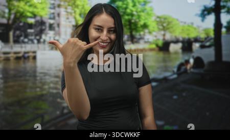 Shaka sign with thumb and pinky raised, surfer gesture of summer ...