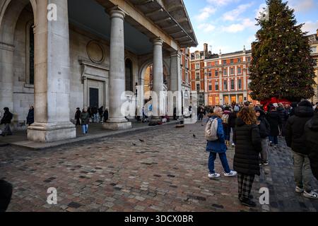 Festive scene at Covent Garden in London on 24 December 2025, featuring ...