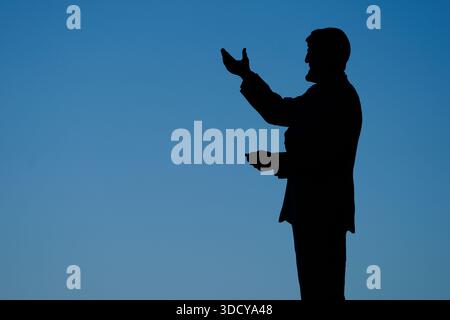 Jimmy Hill statue silhouette outside the stadium before the Sky Bet ...