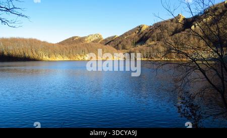 Sunny winter landscape of Lago Santo Parmense and Mariotti refuge. LAGO ...