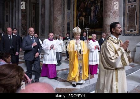 Pope Leo XIV leaves at the end of a mass at Stade Louis II in ...
