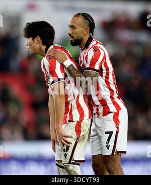 Stoke City's Sorba Thomas (right) and Stoke City's Lamine Cisse before ...