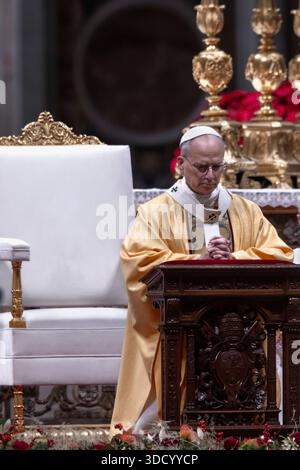 Pope Leo XIV prays during his visits at the Basilica of Saint Peter in ...