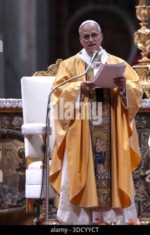 Pope Leo XIV prays during his visits at the Basilica of Saint Peter in ...