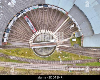 Aerial Top View of Railway Roundhouse with Turntable and Red Train ...