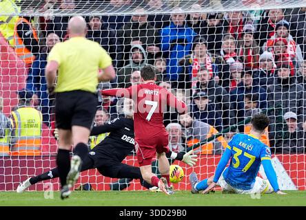 Liverpool's Florian Wirtz scores their side's third goal of the game ...