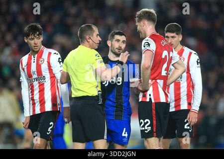 Bournemouth's Lewis Cook speaks with referee Chris Kavanagh after the ...