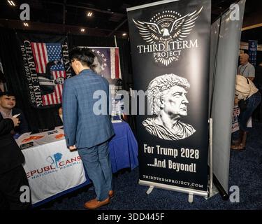 An exhibitor at AmericaFest 2025 in Phoenix, AZ. Dec. 19, 2025 Stock ...