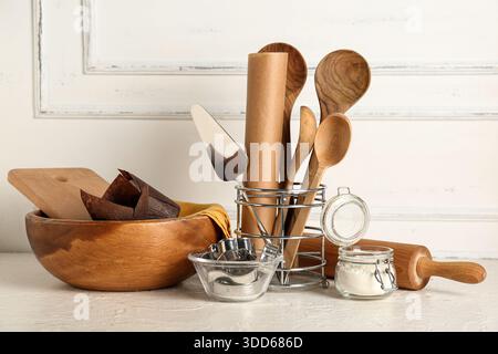 Set of different baking utensils and flour on light background Stock ...