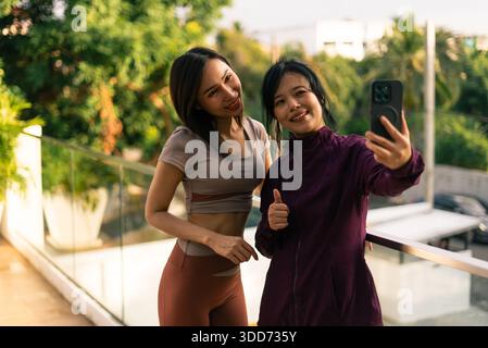 Asian women using smartphone for video call telemedicine consultation ...
