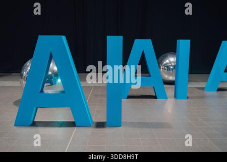 A blue ‘AI’ sign seen during an IT conference. (Photo by Marek Antoni ...