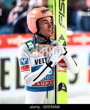 Stefan Kraft, of Austria, reacts after his second round jump at the ...