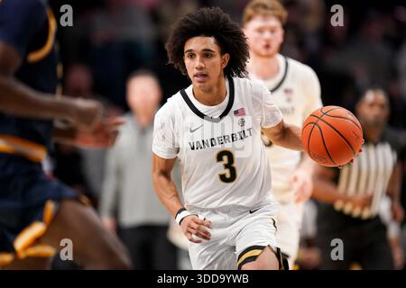 Vanderbilt guard Tyler Tanner (3) drives past South Carolina forward ...