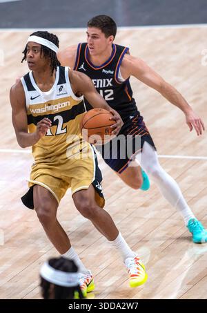 Phoenix Suns' Collin Gillespie (12) tries to steal the ball from ...