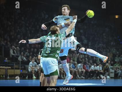 Erik Persson (Frisch Auf Goeppingen, #22) in the duel with Linus Schmid ...