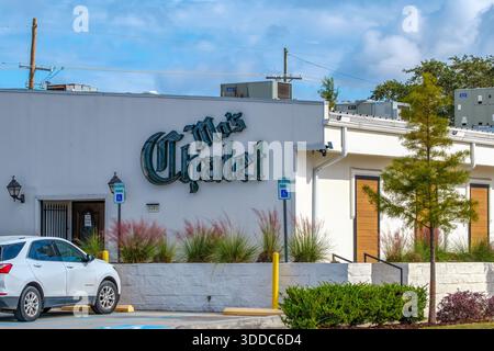 Metairie, LA, USA - November 21, 2025: Sign for The Looking Glass ...