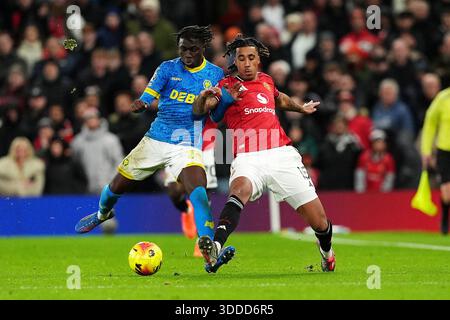 Wolverhampton Wanderers' Mateus Mane (left) with manager Rob Edwards ...