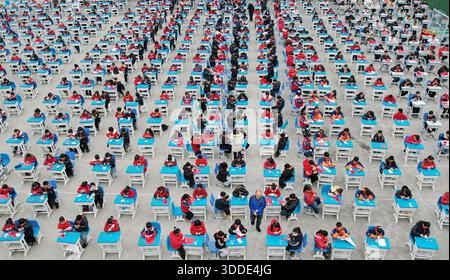 ENSHI, CHINA - DECEMBER 30, 2025 - Primary school teachers and students ...