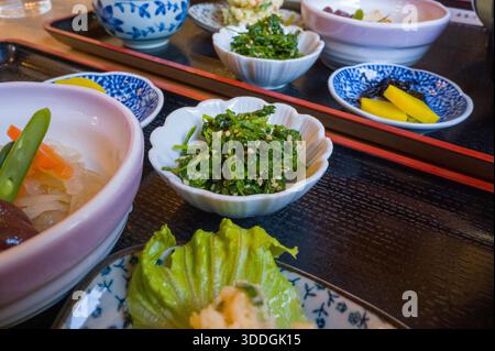 Fresh vegetable set side dish in local restaurant in Trang. Traditional ...